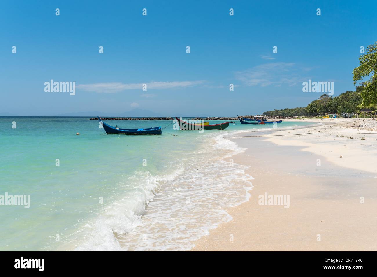 The village Pasir Putih with its dreamlike white sandy beach in the ...