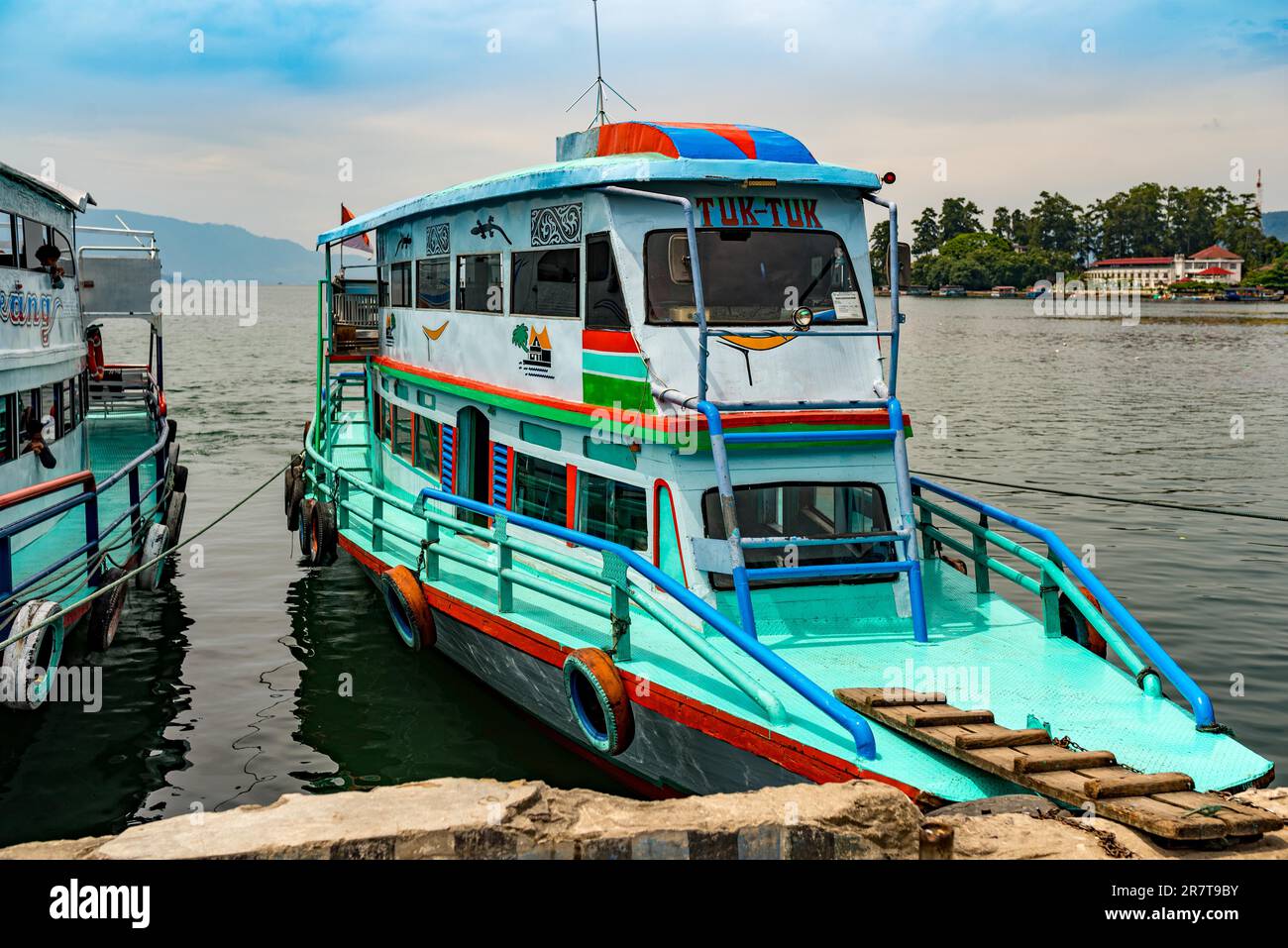 The jetty of Parapat with one its many ferries on the Lake Toba, the ...
