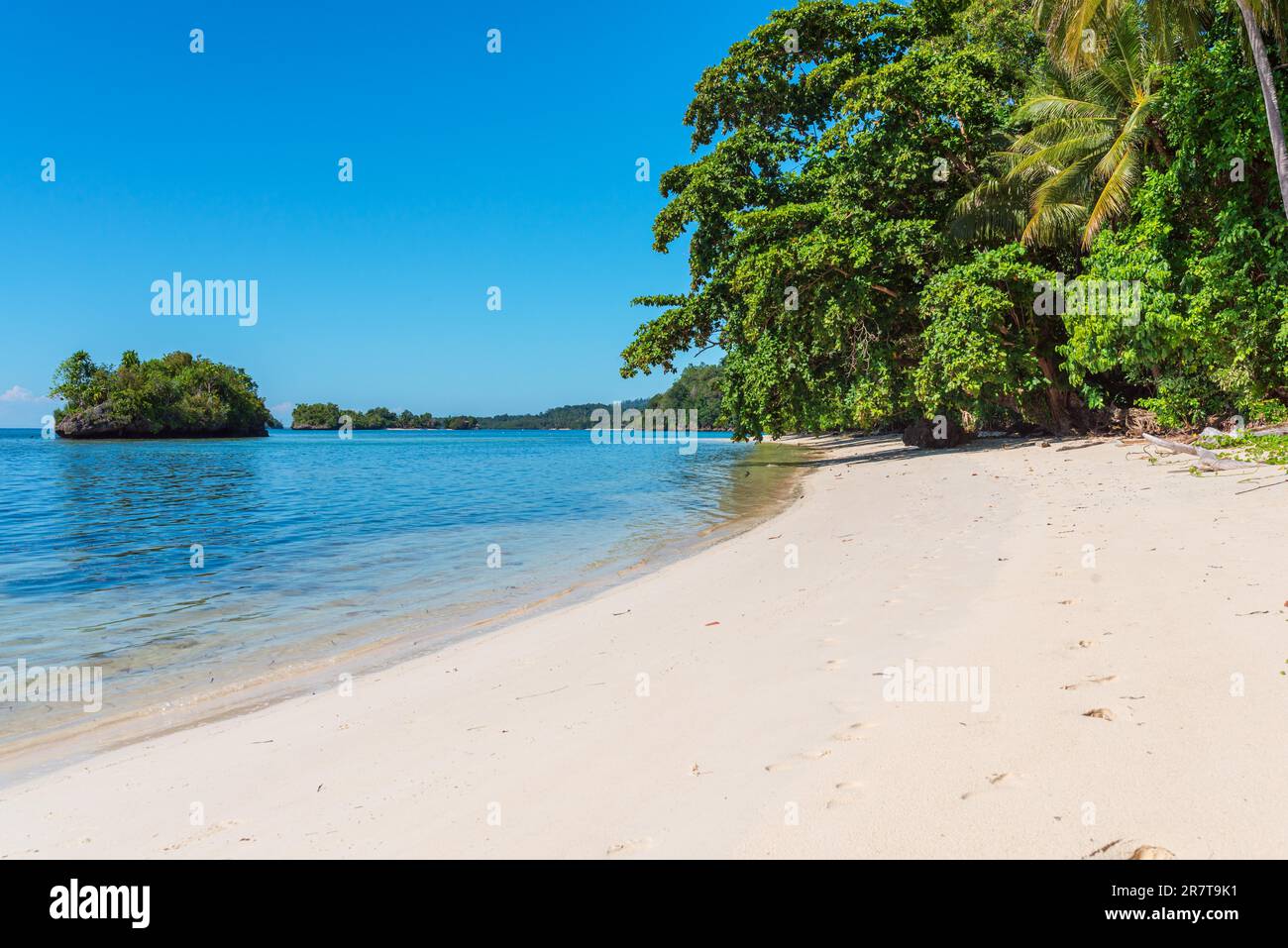 The white sandy beach of the Togian Island Batudaka in the Gulf of ...