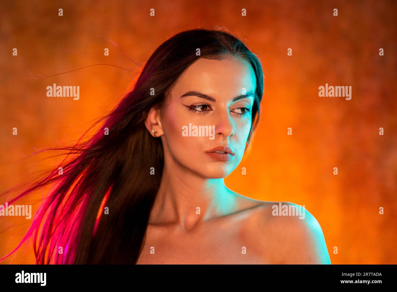 Portrait shot of a pretty young woman in RGB colors Stock Photo - Alamy