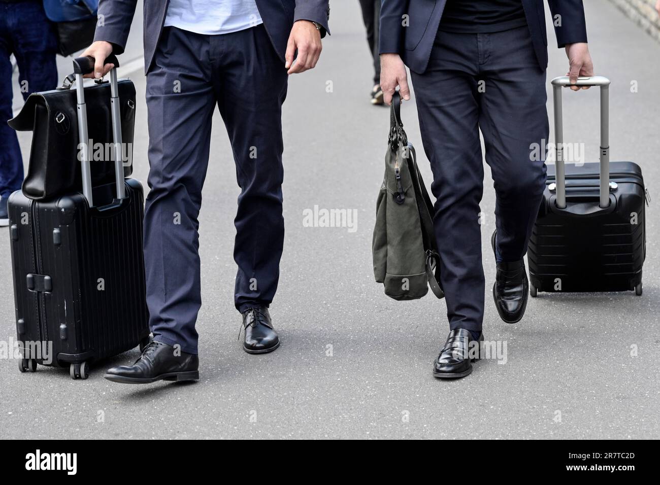 Suit man trolley case hi-res stock photography and images - Alamy