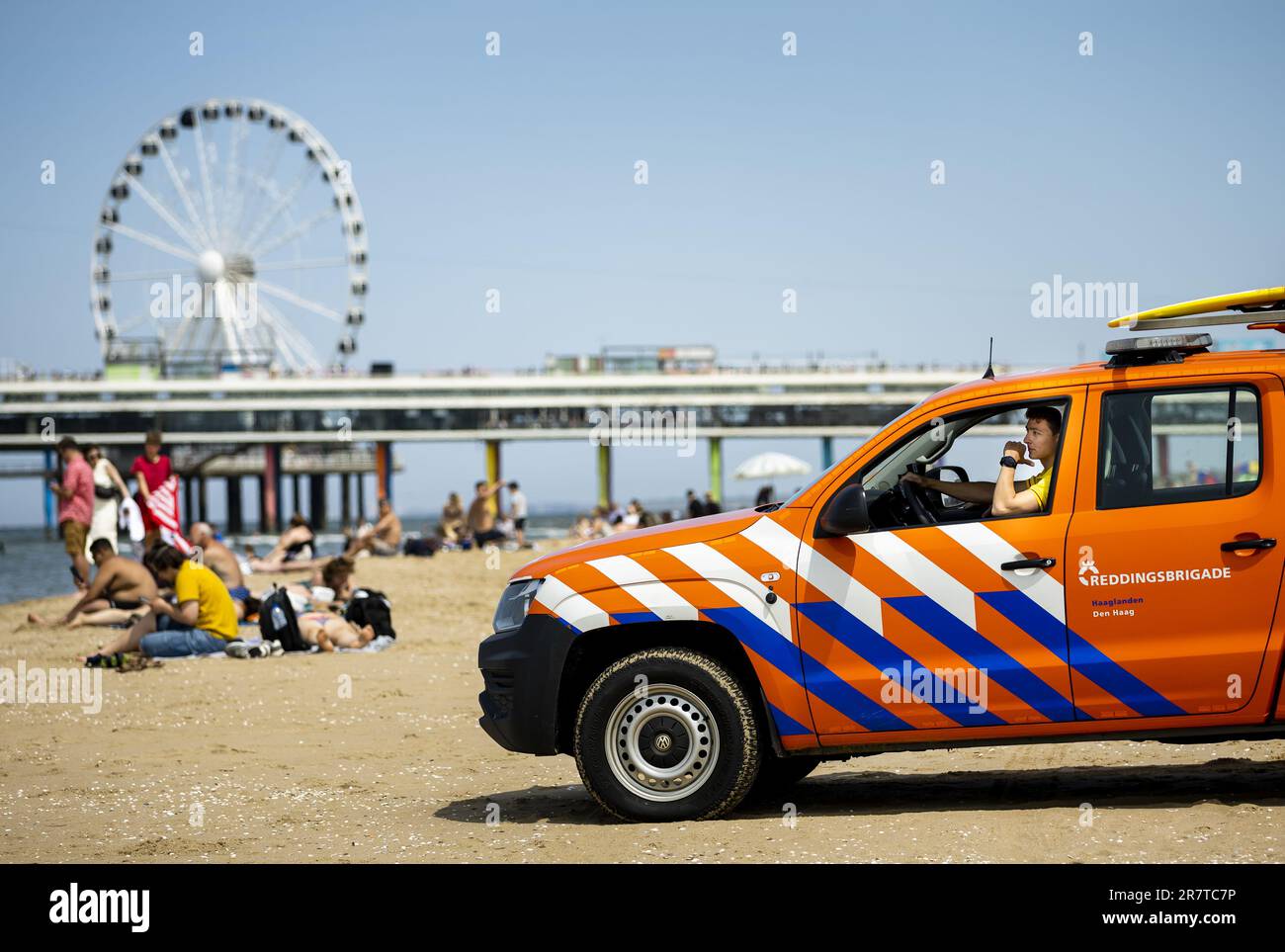 SCHEVENINGEN - Employees of the Hague Voluntary Rescue Brigade at work ...