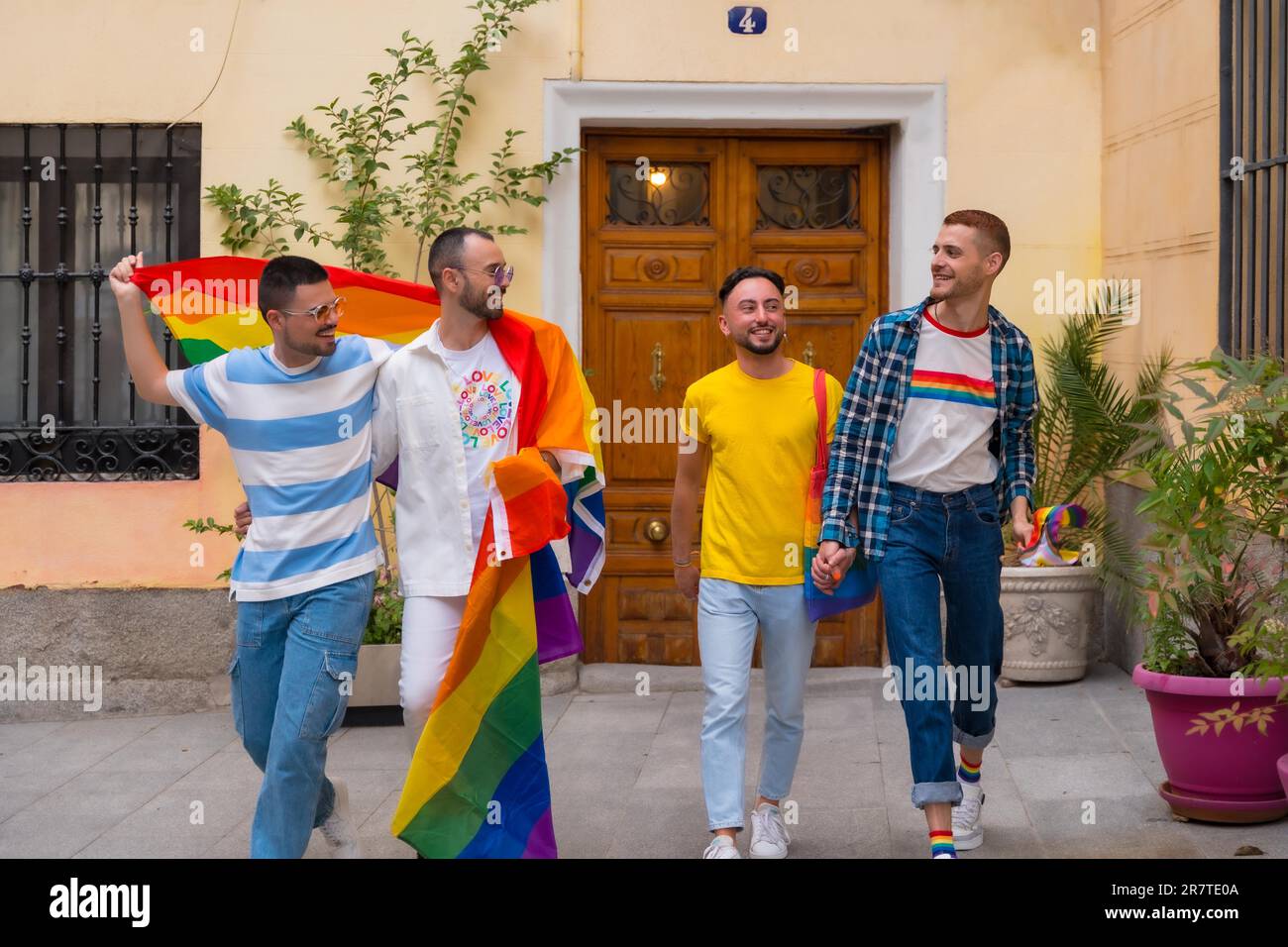 Lgbt concept, portrait of gay men friends having fun at gay pride party ...