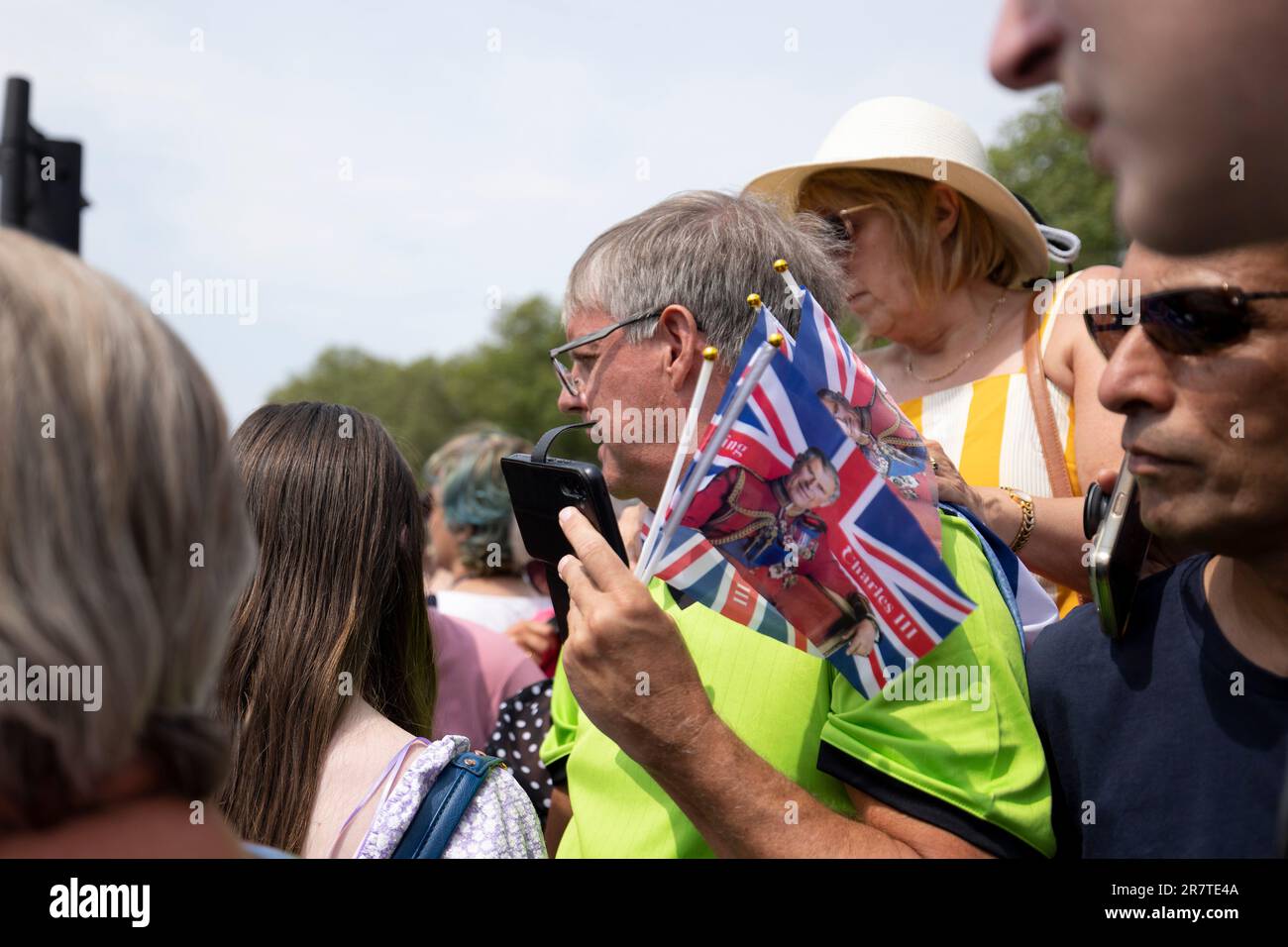 London, UK. 17th June, 2023. A Royal fan is seen holding flags with the ...