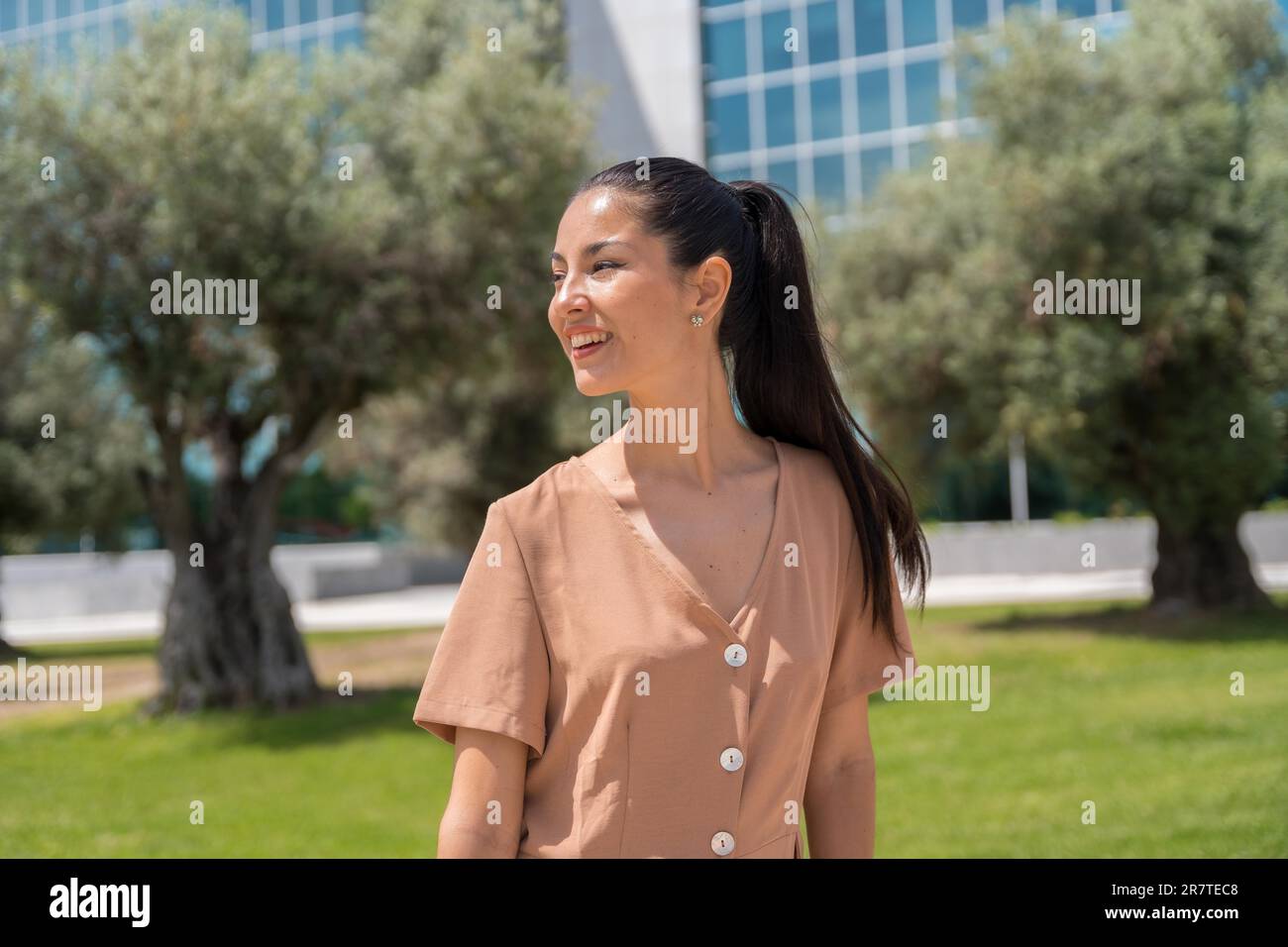 Portrait of a Latin woman executive or businesswoman in a business ...