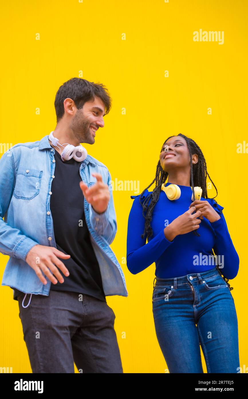 Multiethnic dancer couple of Caucasian man and black ethnic woman on a ...