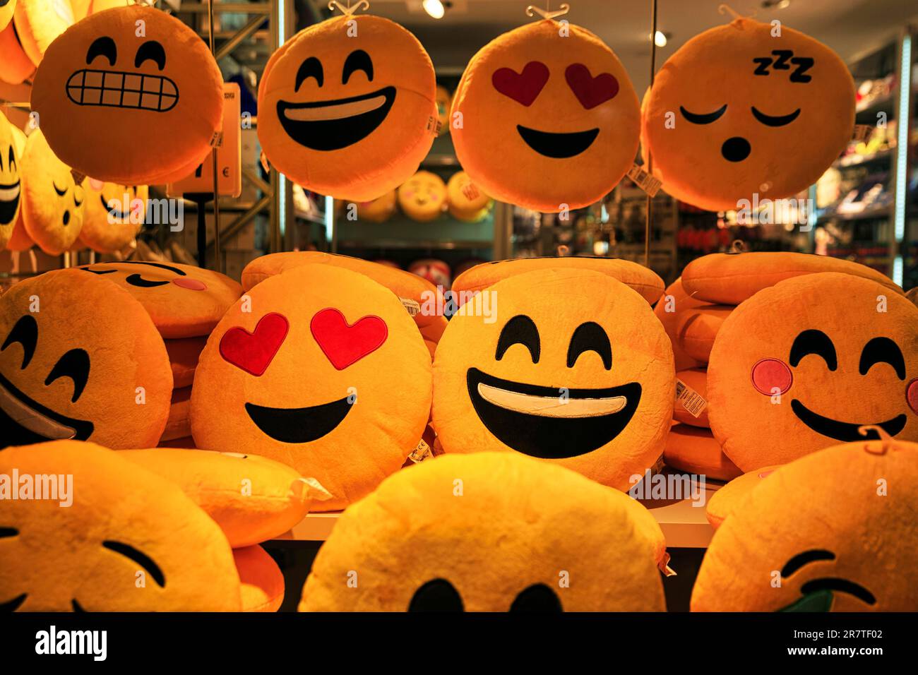 Many different smileys, emoticons, round cushions, rows in a souvenir ...