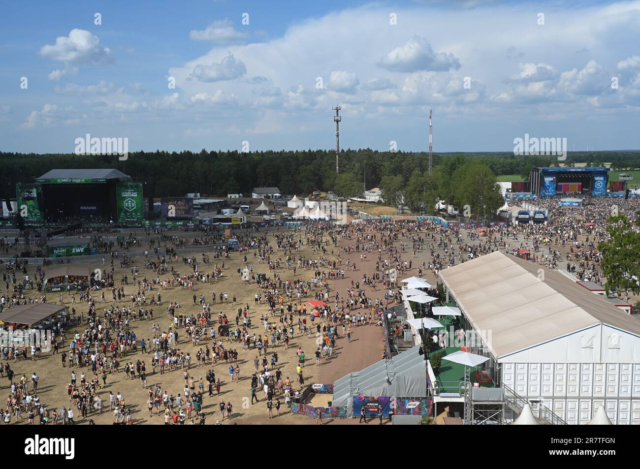 17 June 2023, Lower Saxony, Scheeßel: Festival visitors are on the move ...