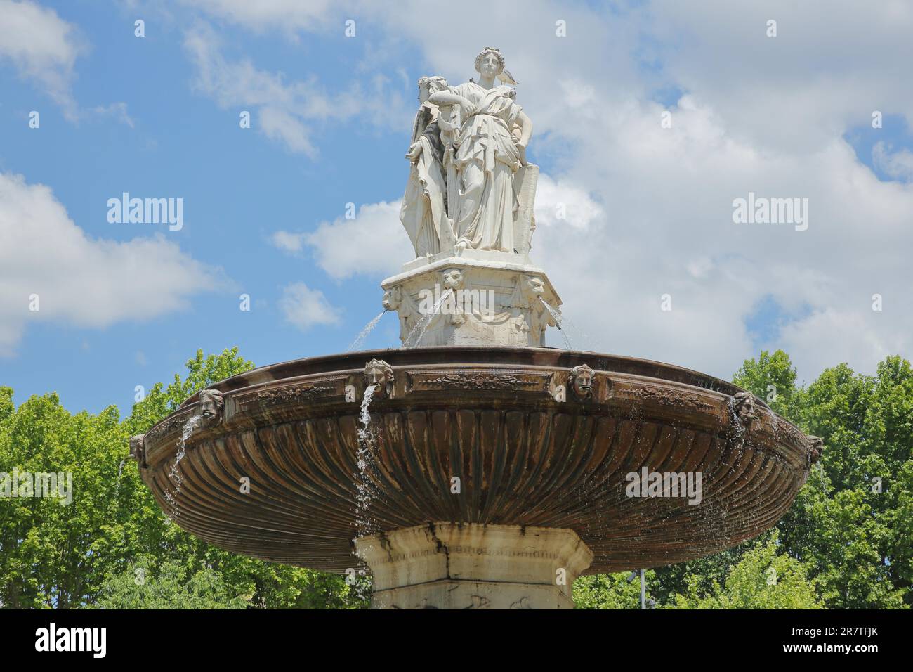 White figures at the ornamental fountain Fontaine de la Rotonde, Place du General de Gaulle ...