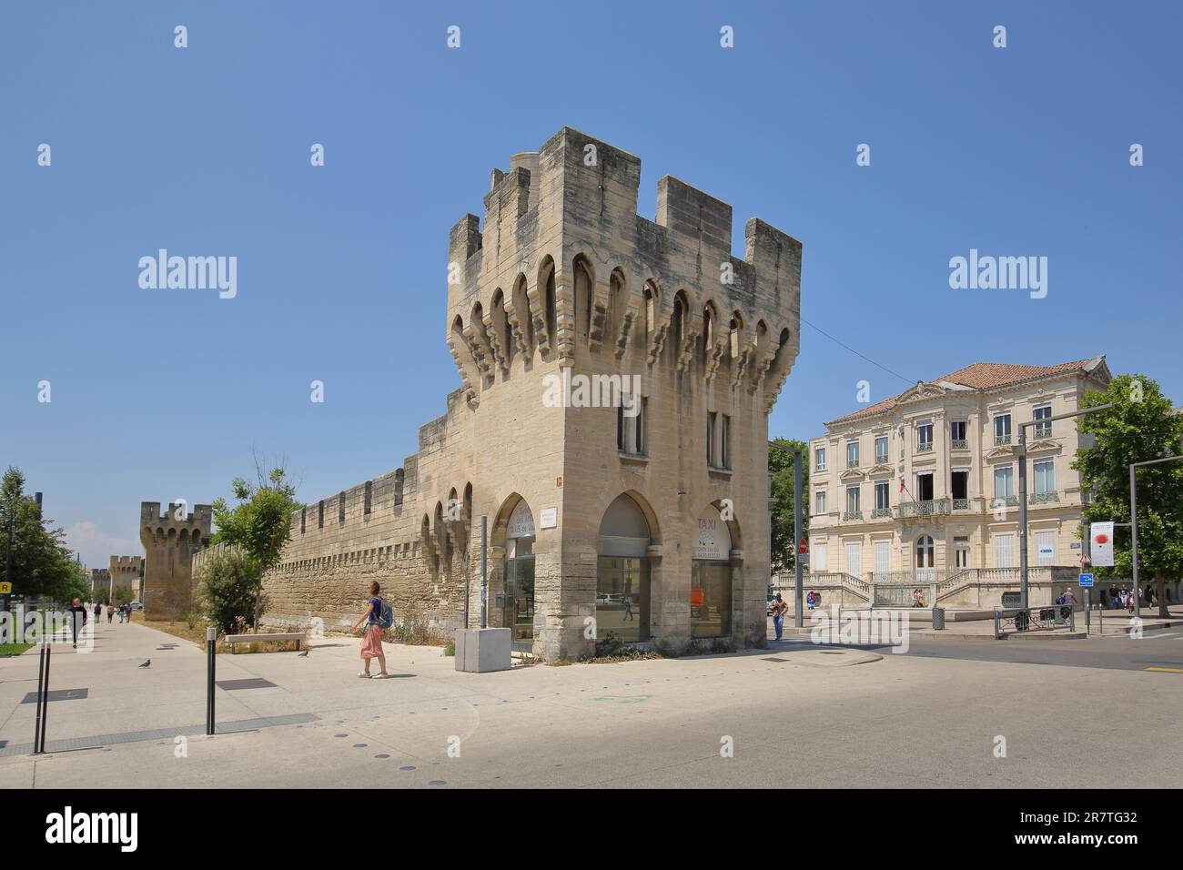 Historic city wall with defence defence tower, pedestrian, building ...