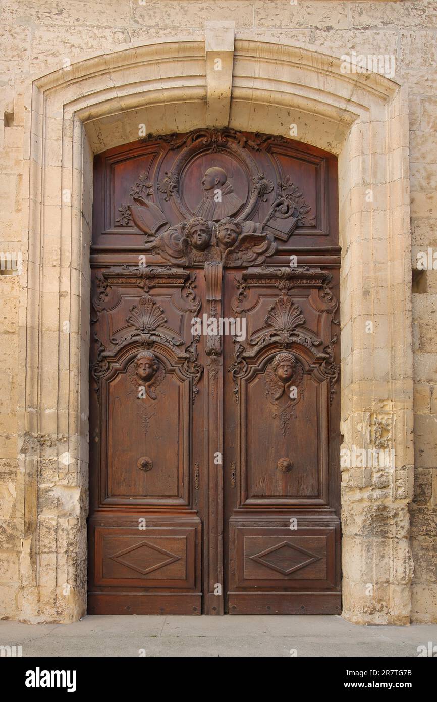 Door with wood carving and decorations at the Musee Archeologique De L ...