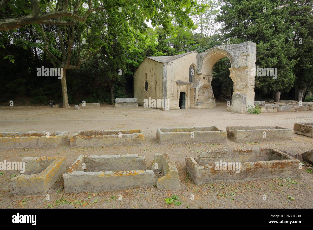 Stone sarcophagi and archway Alyscamps, necropolis, historical, ancient ...