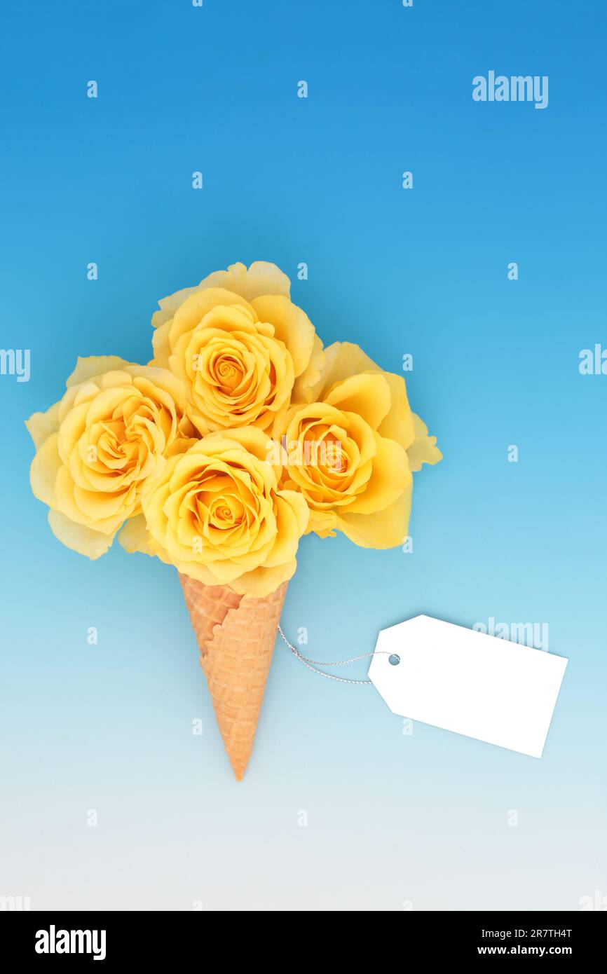 Surreal summer ice cream cone with yellow rose flowers on gradient blue ...