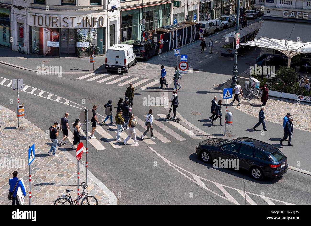 Pedestrian at zebra crossing, Helmut-Zilk-Platz, Vienna, Austria Stock ...