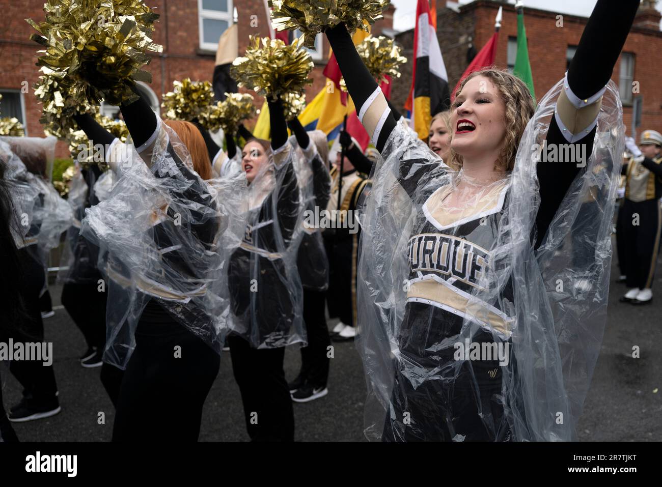 American cheerleaders warm up before the start of the St Patrick's Day ...