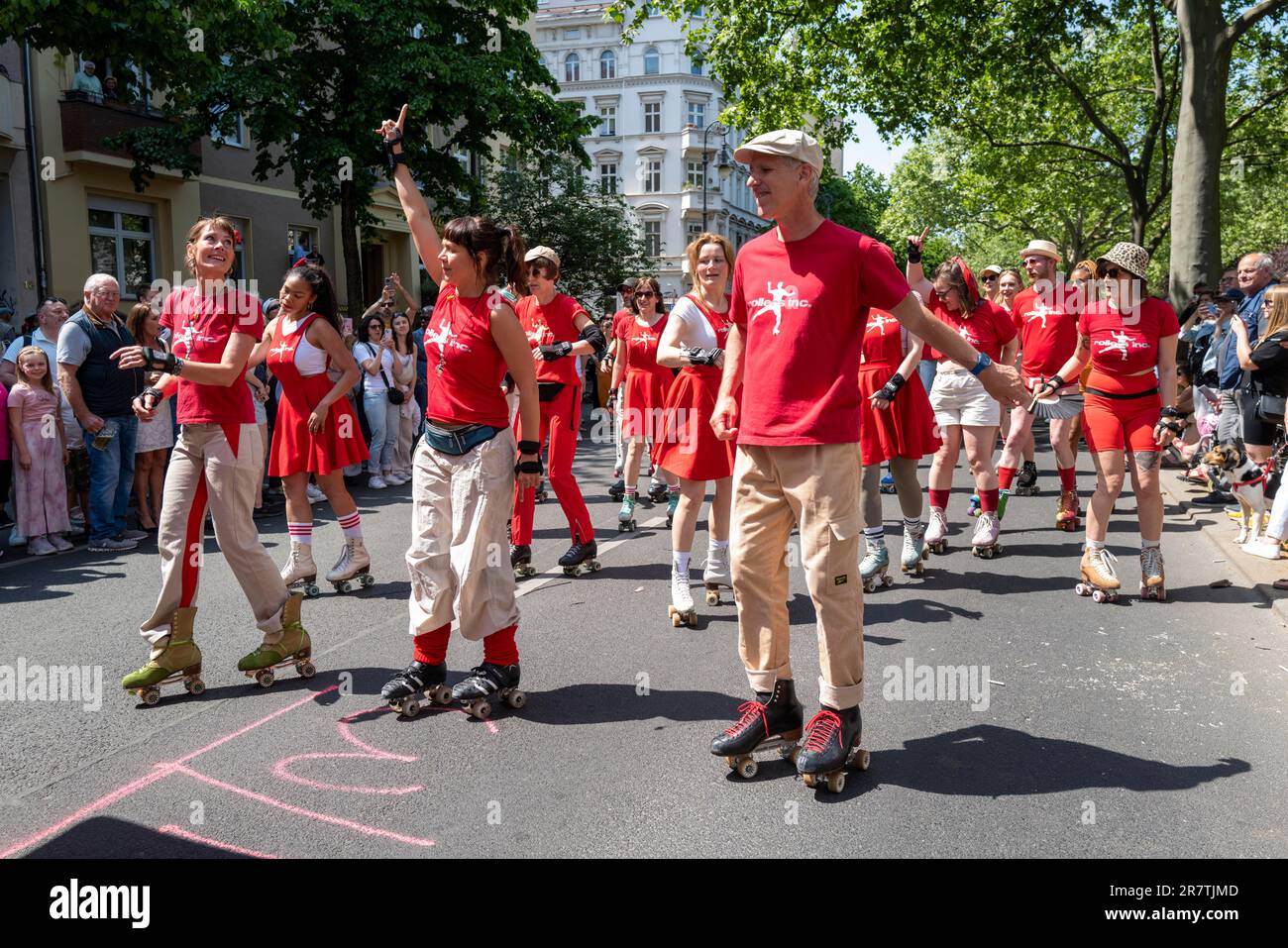 A participating group of rollerbladers give a warmly-received ...