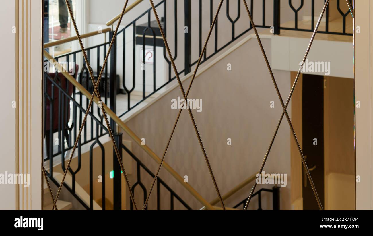 Modern Staircase with Geometric Railings and Elegant Interior Design ...