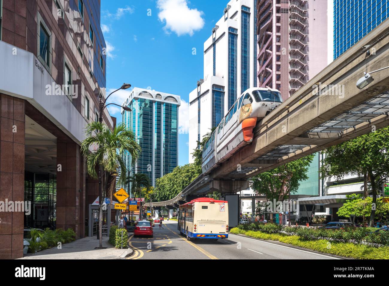 Streetscape of traffic, bridge and train in the Bukit Bintang district ...