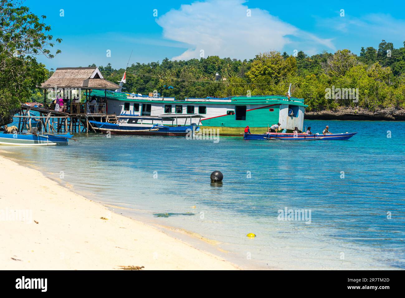 Islanders travel from island to island by slow boat in the Togian ...