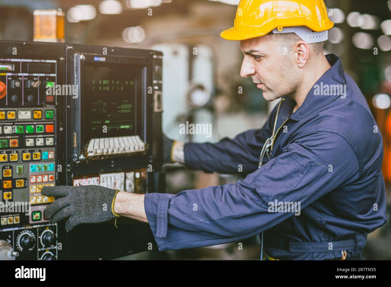 Man using lathe hi-res stock photography and images - Alamy