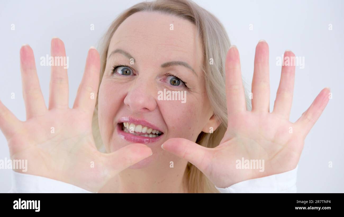 Close up of isolated female hand shows fist fist, then one, two, three, four, five fingers ...