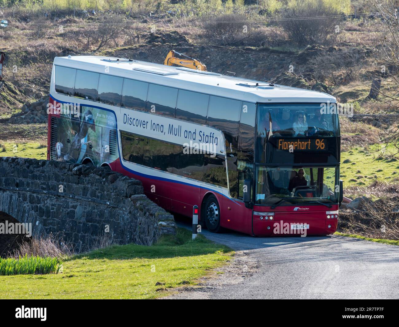 Excursion bus passes historic narrow bridge, isle of mull, Scotland, UK ...