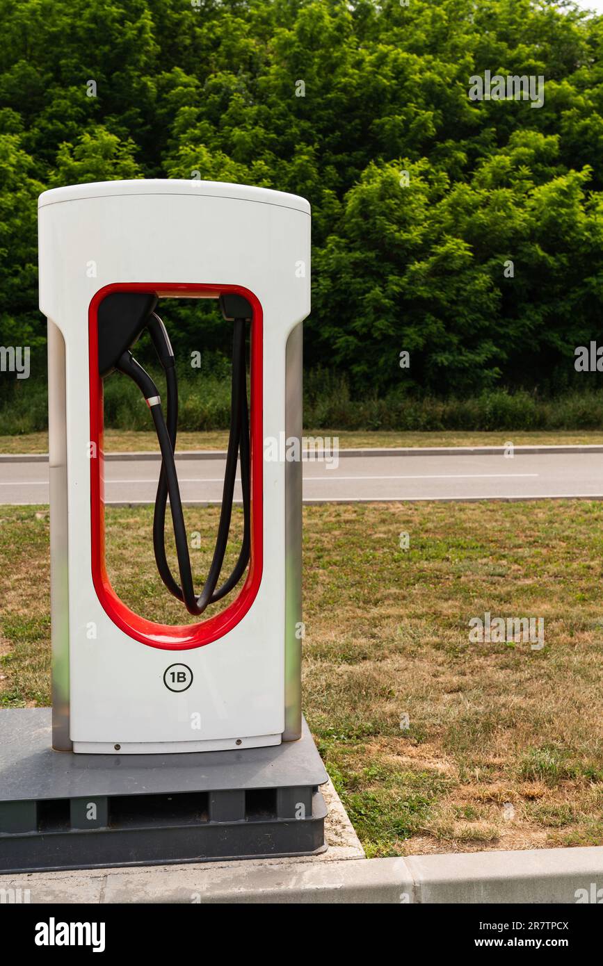 Electric car charging station on a street Stock Photo - Alamy