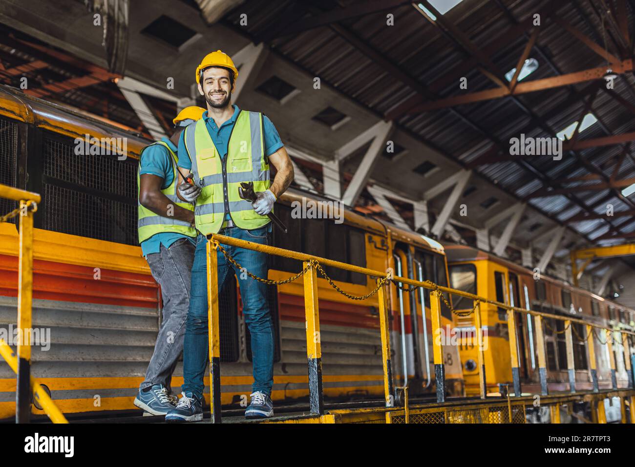 happy worker engineer male working heavy industry locomotive service ...
