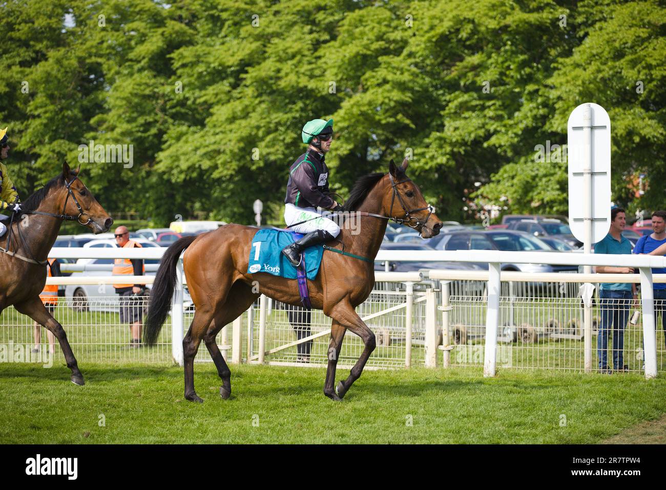 Jockey Jason Hart walking back to the stables after a race at York ...