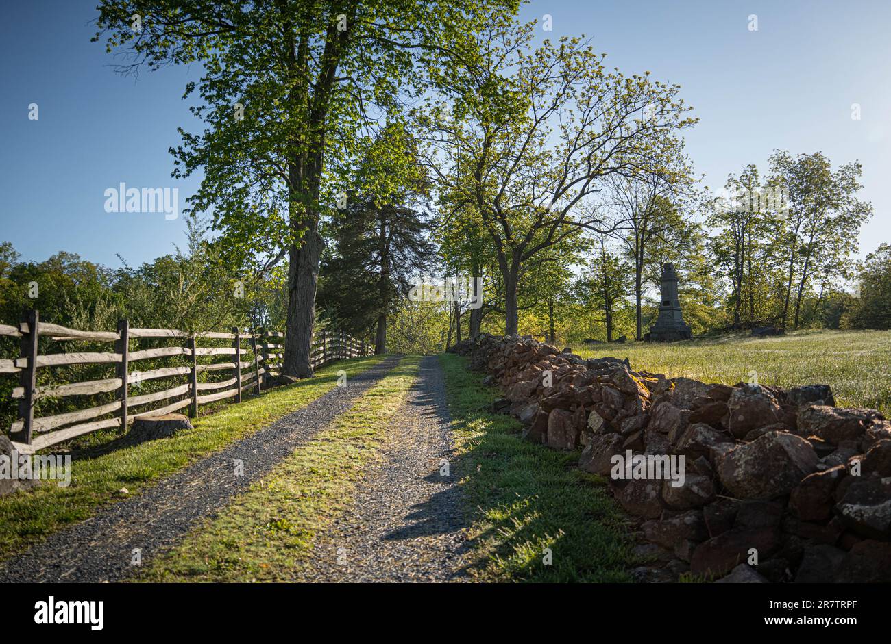 A country road next to a stone wall at morning in Gettysburg Stock ...