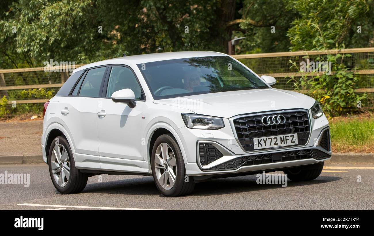 Milton Keynes,UK - June 18th 2023: 2022 white AUDI Q2 S LINE 35 TFSI S-A car travelling on an ...
