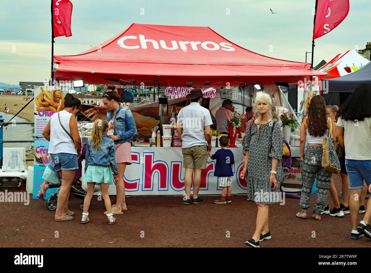 Colourful Churros stall at the pop-up street market and food festival ...