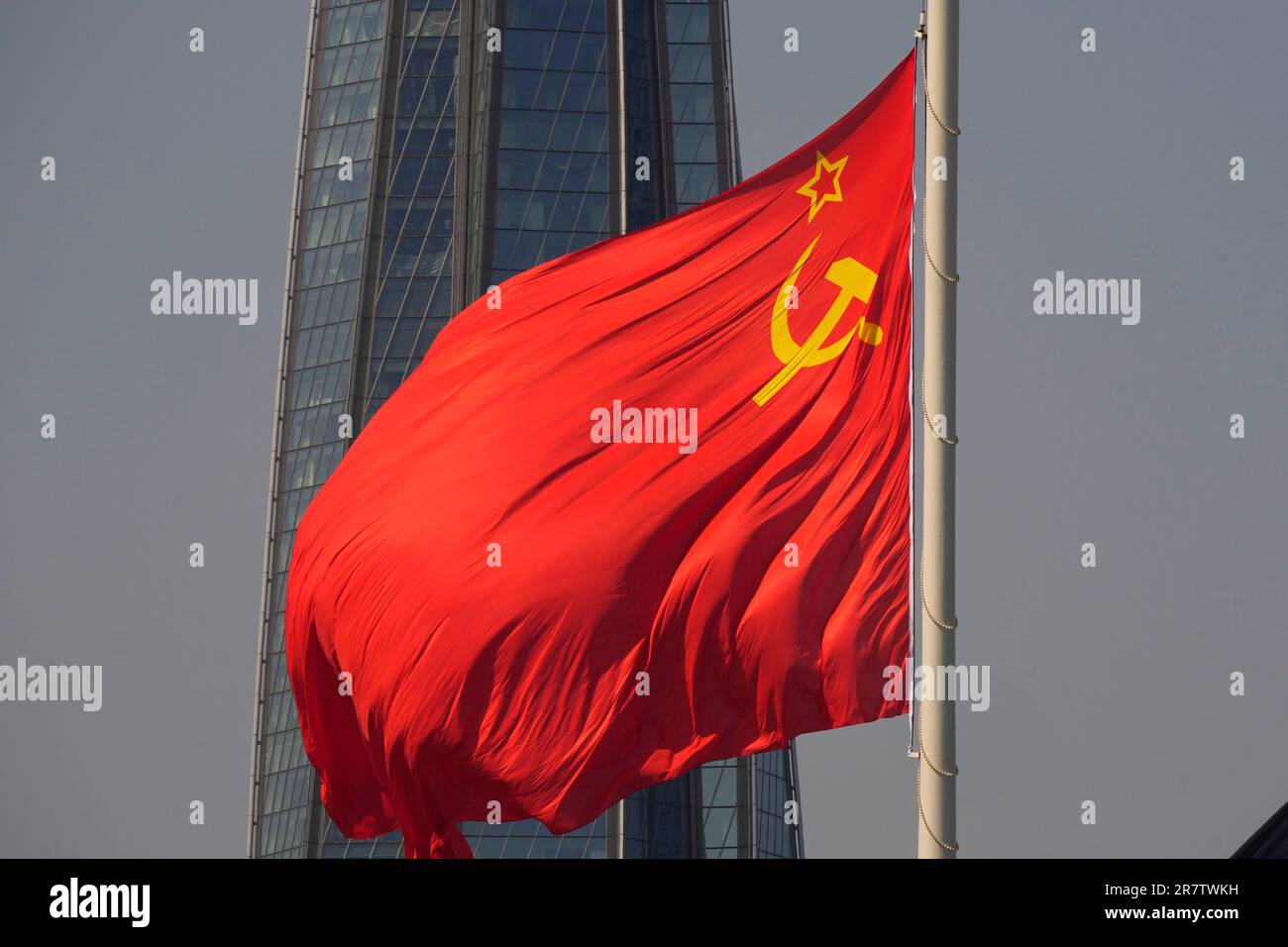 A former Soviet Union flag flutters in the wind during a ceremony of ...