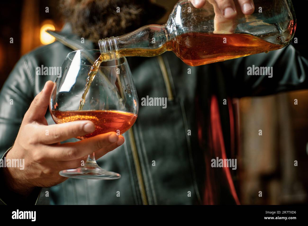 Whisky, brandy or cognac in glass. Alcohol addiction. Addictive group ...
