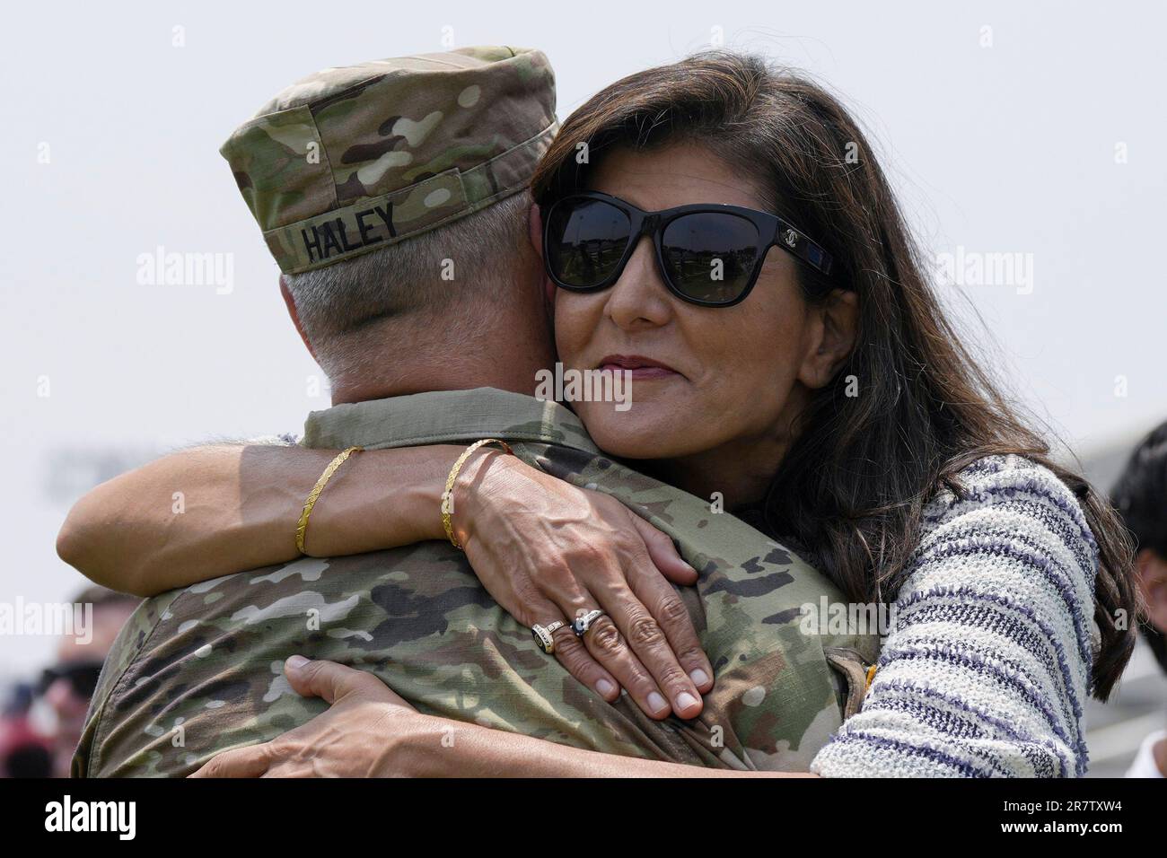 Republican presidential candidate Nikki Haley, right, hugs her husband ...