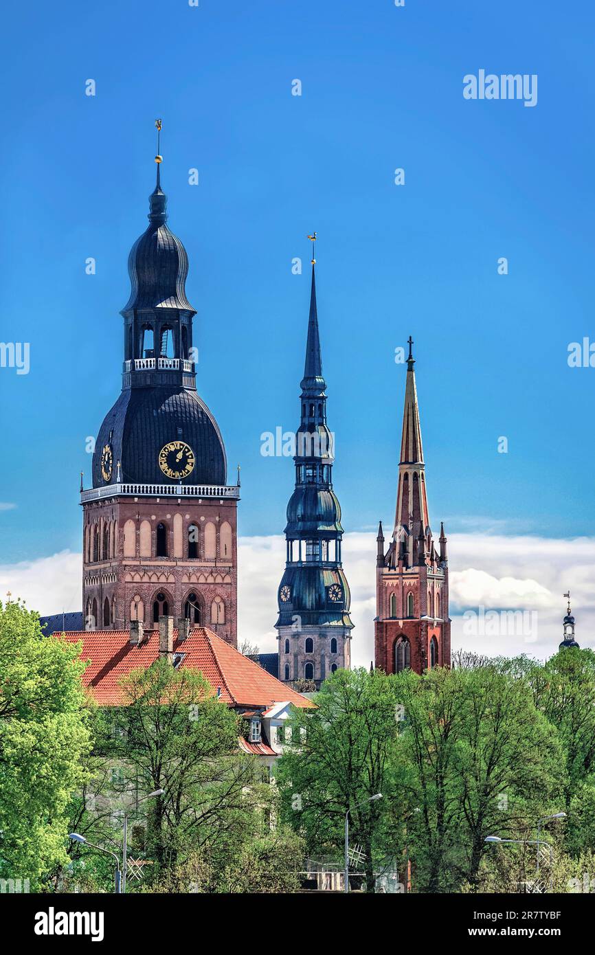 View of row of towers and spires in Riga, Latvia. Copy space in clear ...