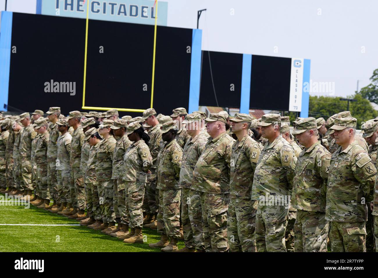 Maj. Michael Haley, at right, stands and looks at the crowd during a ...