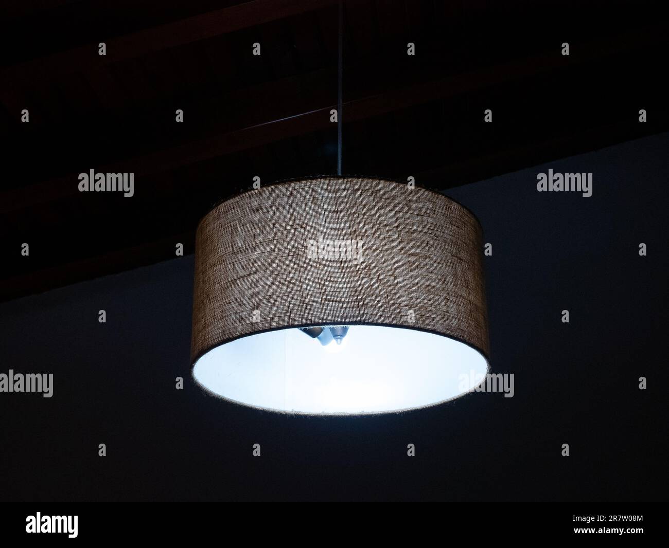 Jute Thread Pendant Lamp Lit on a Dark Background Stock Photo - Alamy