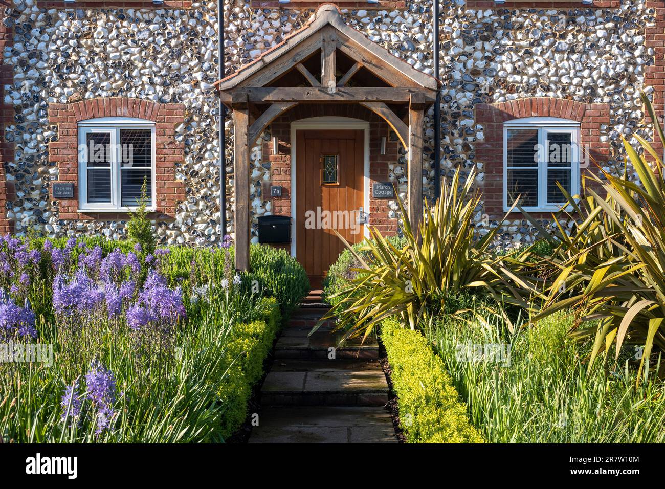 Traditional pretty brick and flint cottage with porch, dormer windows ...