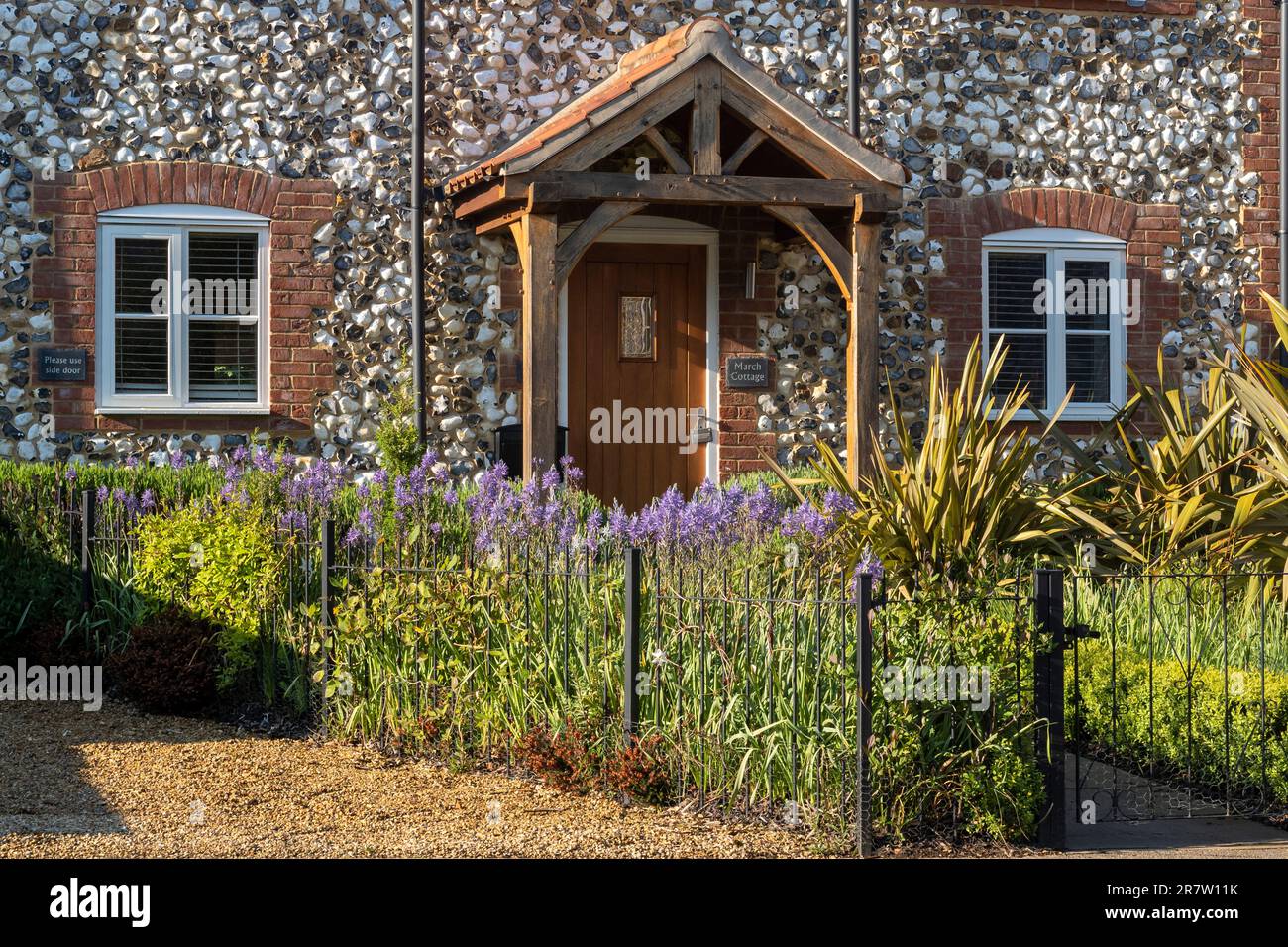 Traditional pretty brick and flint cottage with porch, front garden and ...