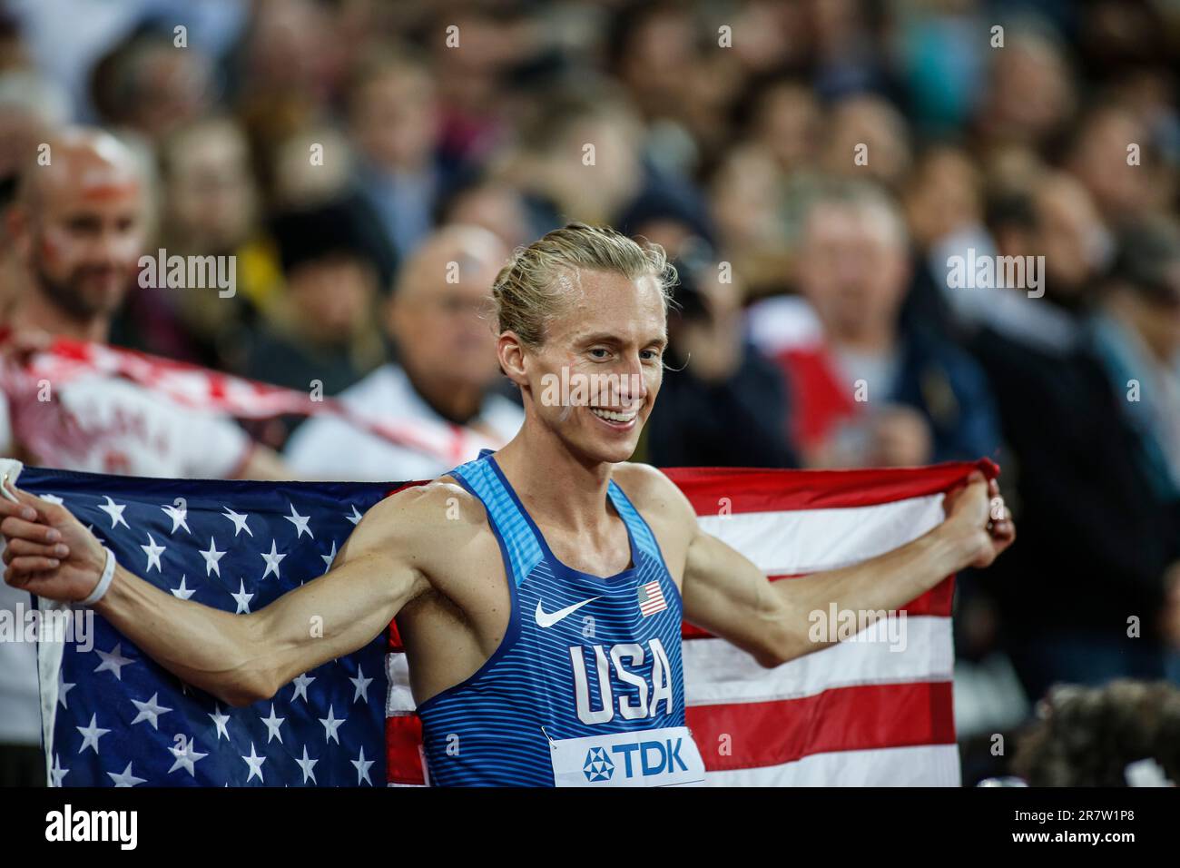 Evan Jager with her country's flag in the 3000 Metres Steeplechase at ...