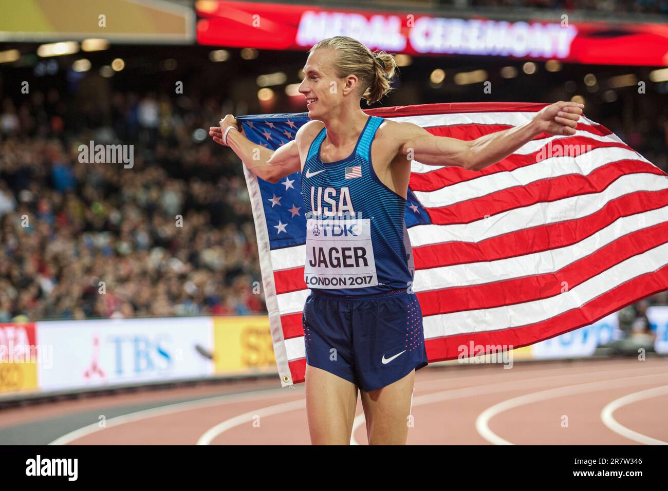 Evan Jager with her country's flag in the 3000 Metres Steeplechase at ...