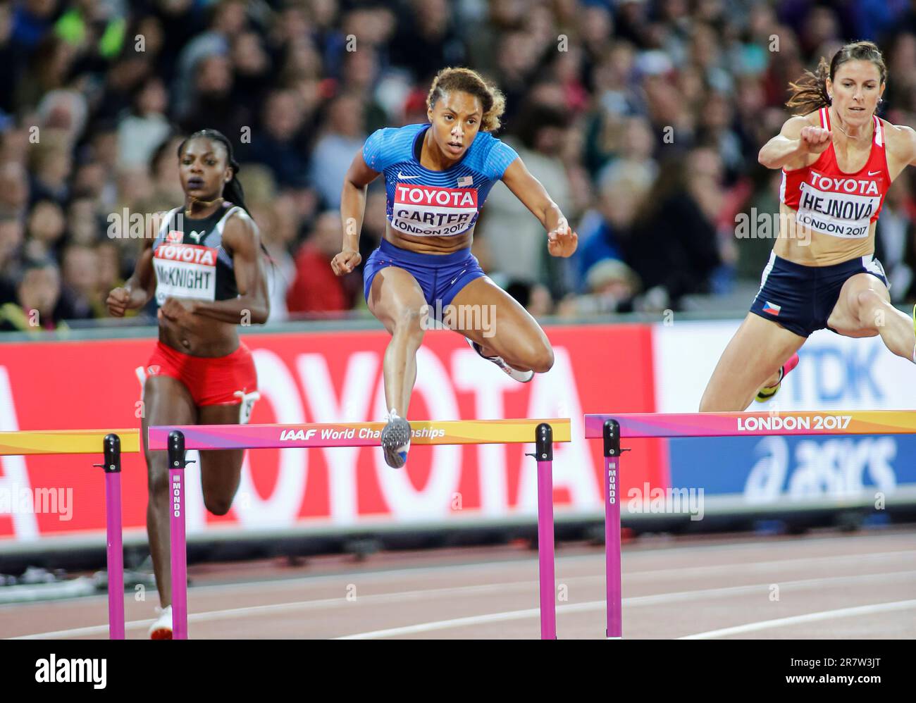 Kori Carter participating in the 400 meters hurdles at the World ...