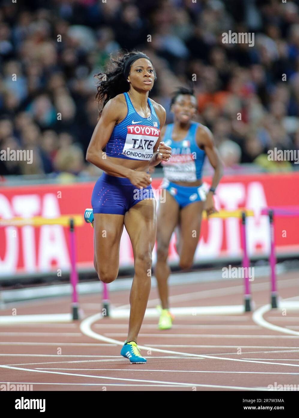 Cassandra Tate participating in the 400 meters hurdles at the World ...