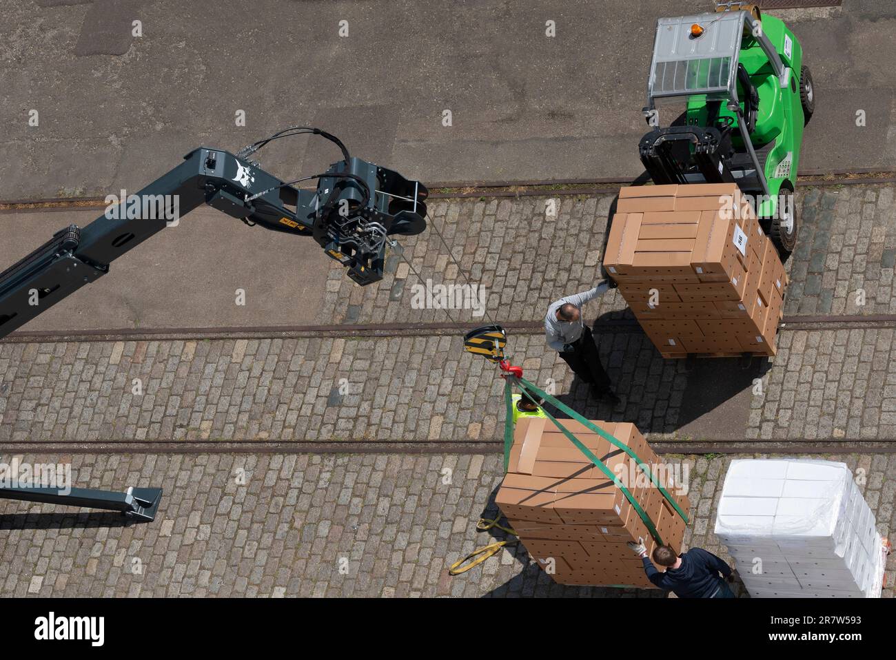 Le Havre, France, Mobile crane lifting goods and loading ships supplies ...