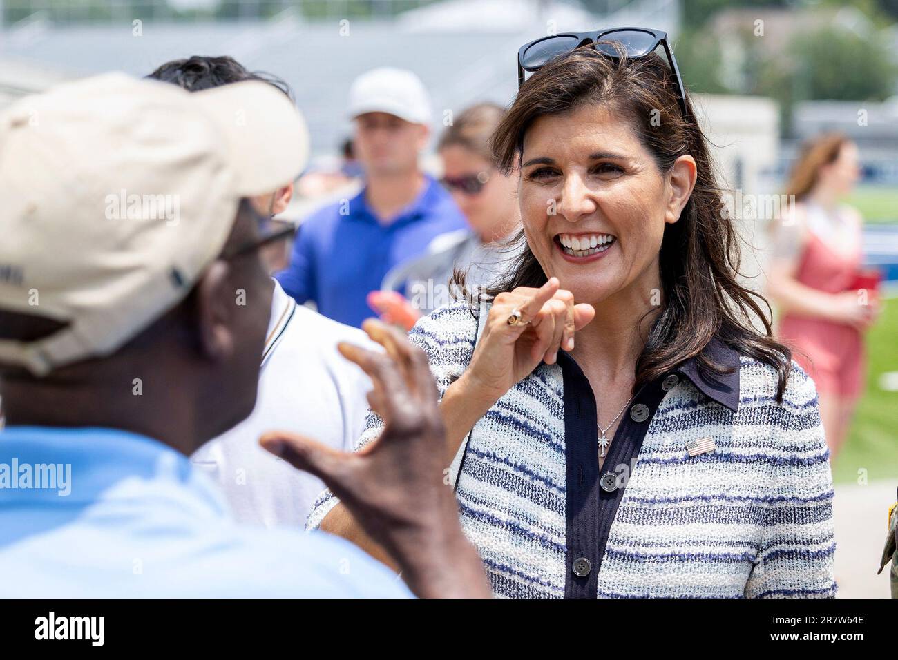 Republican presidential candidate Nikki Haley, right, uses sign ...