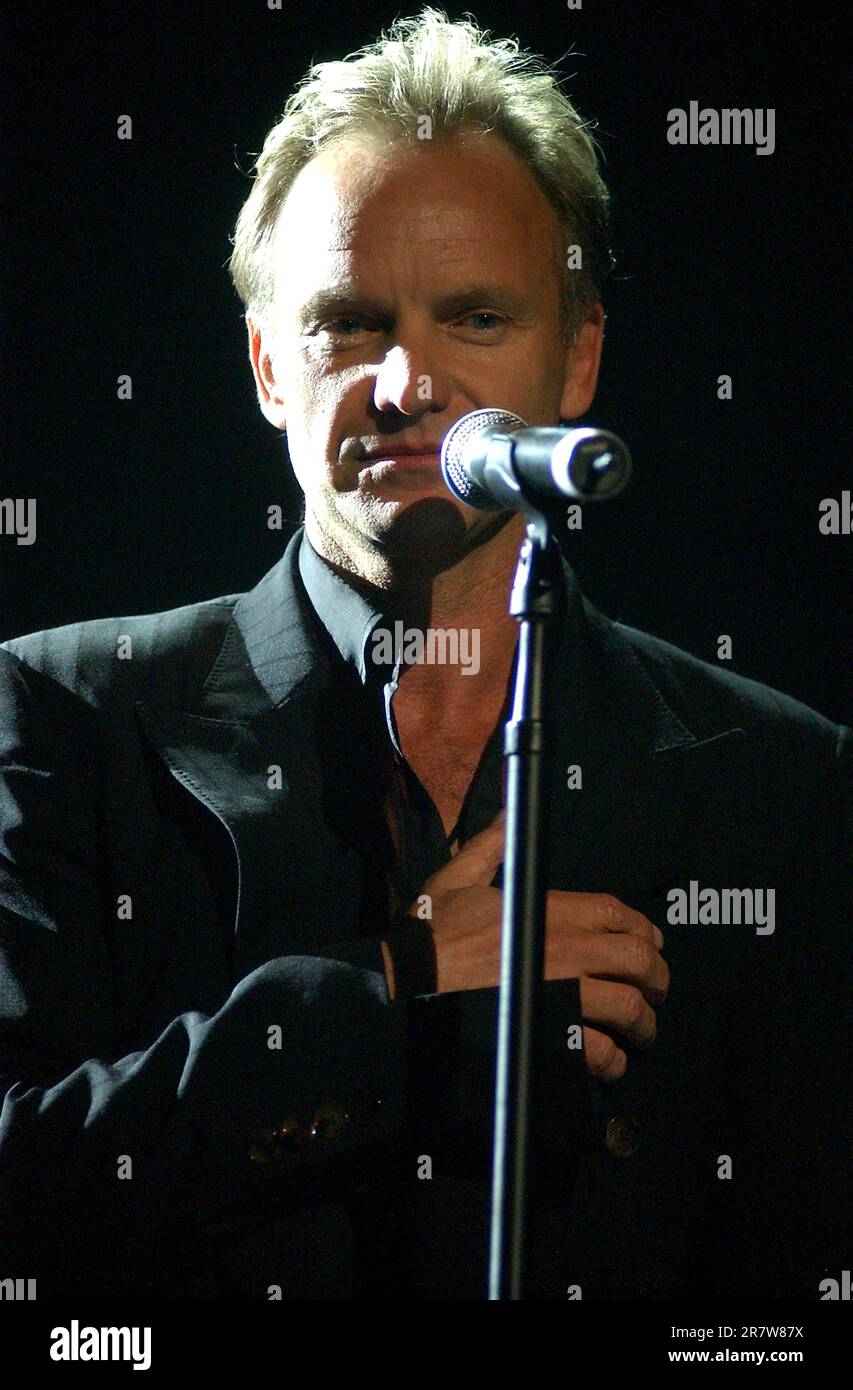 Sting on stage at MusiCares Show, 2004 Credit: Ron Wolfson / MediaPunch ...