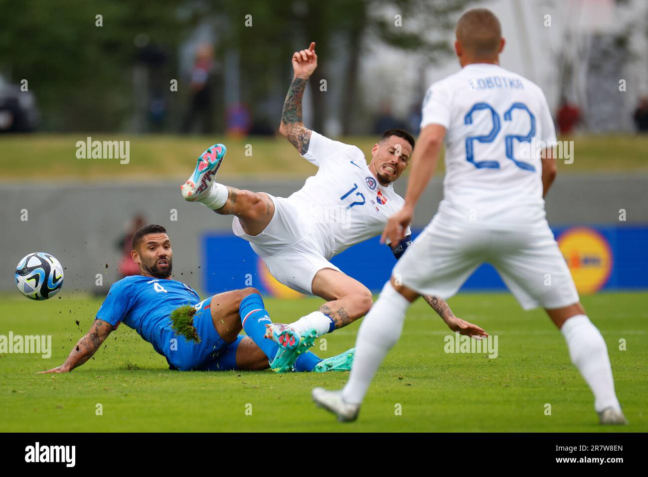Iceland's Guolaugur Victor Palsson, bottom, challenges Slovakia's Marek ...