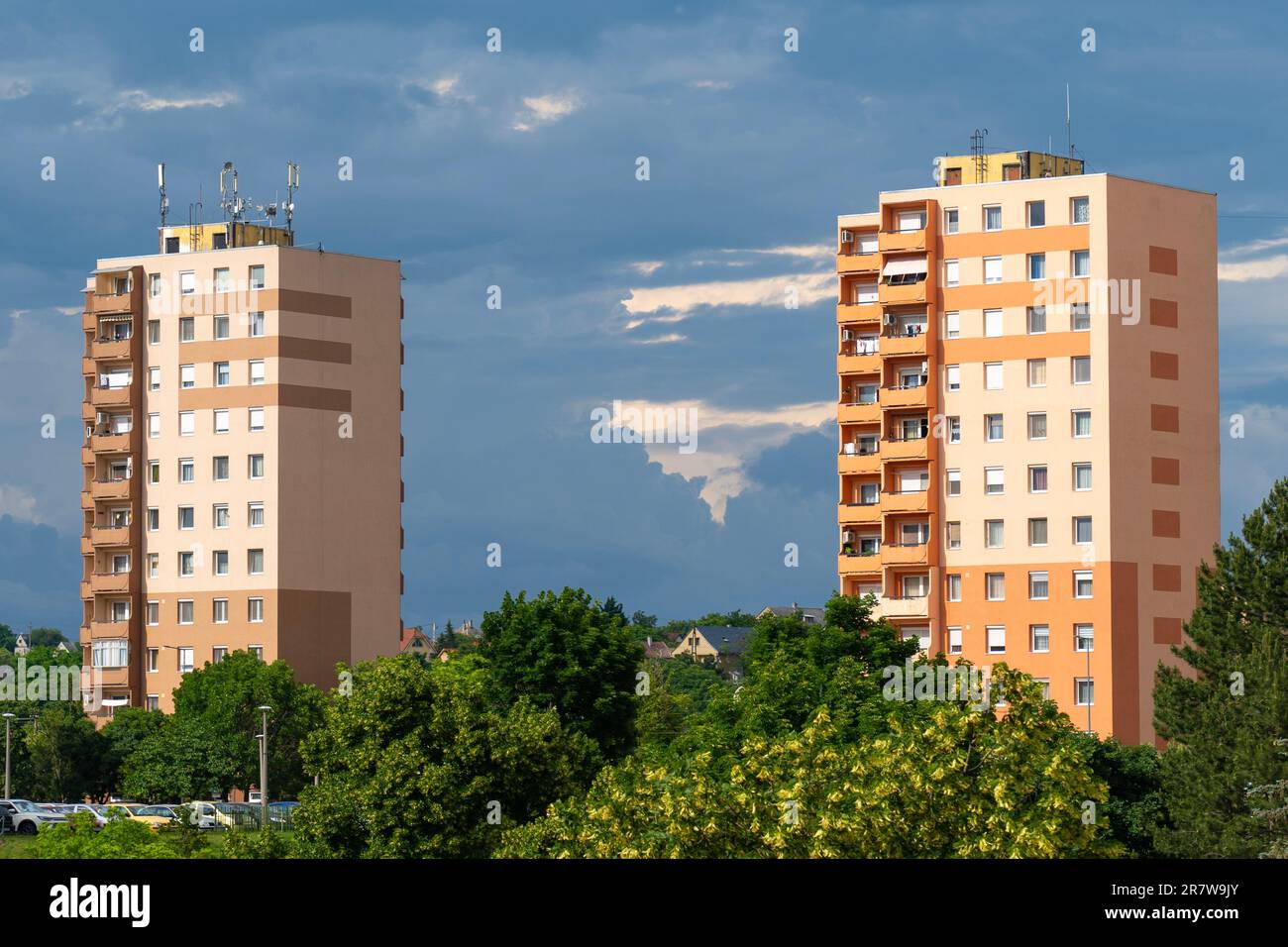Colorful 10-story panel houses, housing estate in Hungary with dark ...