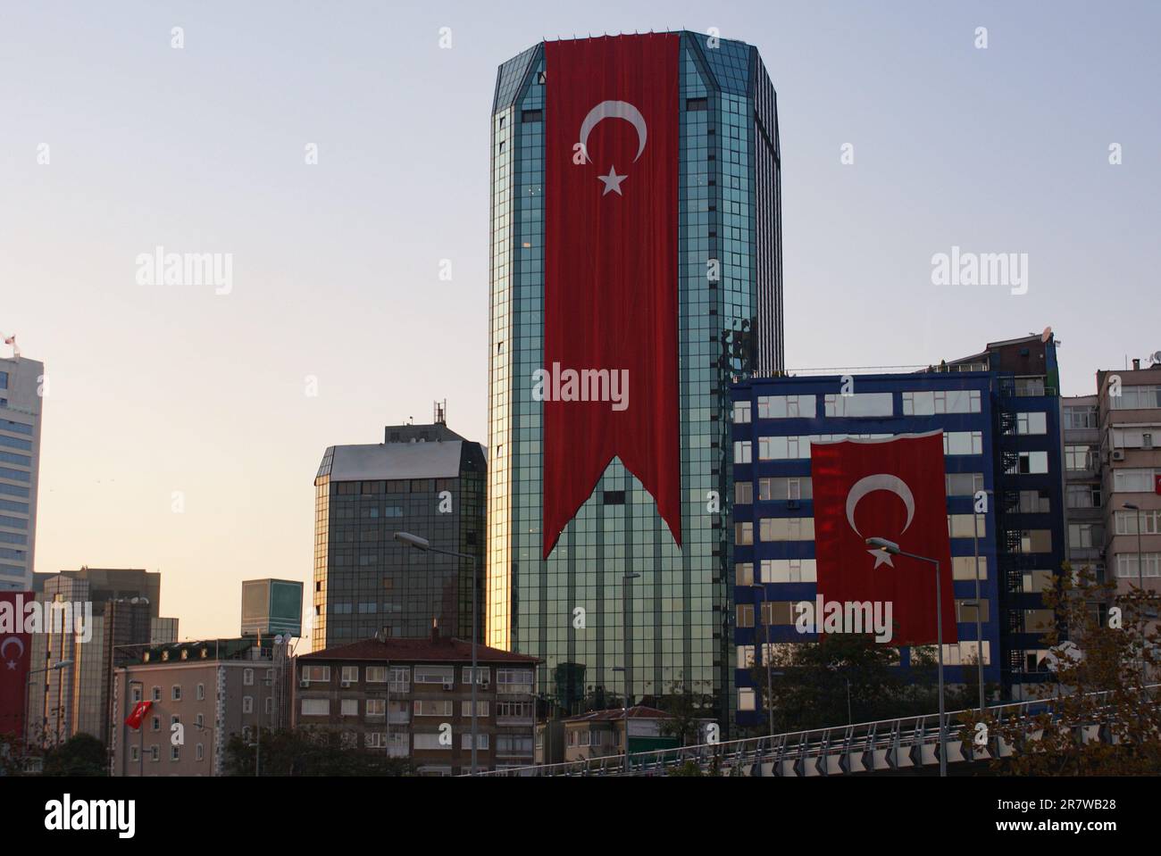 giant turkish flag on modern building against the sky Stock Photo - Alamy